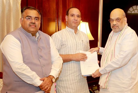 Ex J&K Minister Sunil Sharma meets Amit Shah, raises J&K issues